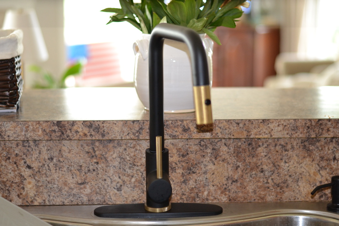 Removing a kitchen faucet with u bracket